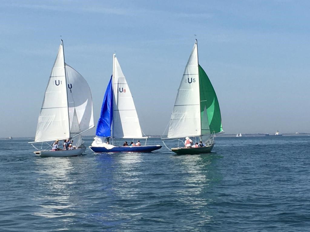 East India RN (navy blue) rams the gybe mark; East India Pulo Aura ...